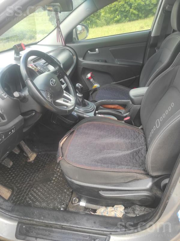 Kia Sportage 2013 in Kraslava, with an engine capacity of 1.70 L and mileage of 149 thousand km for 6700 €, photo 7 on AUTOMOTO.COM.LV