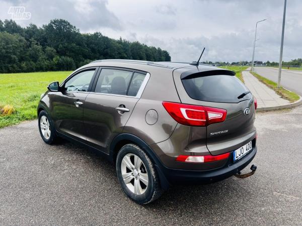 Kia Sportage 2013 in Kaunas on AUTOMOTO.COM.LV Kia Sportage 2013 in Kaunas, with an engine capacity of 1.70 L and mileage of 333 thousand km for 5800 €, photo 4 on AUTOMOTO.COM.LV
