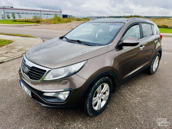 Kia Sportage 2013 in Kaunas on AUTOMOTO.COM.LV Kia Sportage 2013 in Kaunas, with an engine capacity of 1.70 L and mileage of 333 thousand km for 5800 €, photo 5 on AUTOMOTO.COM.LV