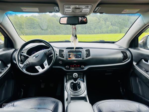 Kia Sportage 2013 in Kaunas on AUTOMOTO.COM.LV Kia Sportage 2013 in Kaunas, with an engine capacity of 1.70 L and mileage of 333 thousand km for 5800 €, photo 6 on AUTOMOTO.COM.LV