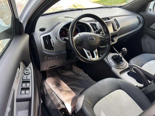 Kia Sportage 2016 in Taurage, with an engine capacity of 1.69 L and mileage of 224 thousand km for 7800 €, photo 7 on AUTOMOTO.COM.LV