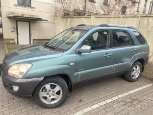 Green Kia Sportage 2005 in Riga, with an engine capacity of 2.00 L and mileage of 208 thousand km for 2160 €, photo  on AUTOMOTO.COM.LV