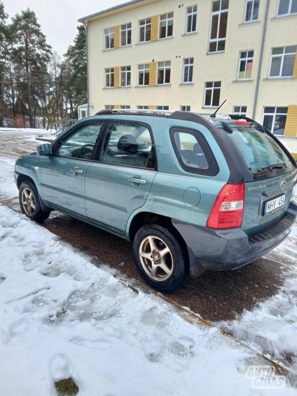 Green Kia Sportage 2006 in Vilnius, with an engine capacity of 2.00 L and mileage of 316 thousand km for 2750 €, photo 1 on AUTOMOTO.COM.LV