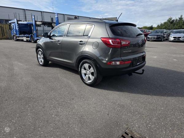 Kia Sportage 2012 in Ukmerge on AUTOMOTO.COM.LV Green Kia Sportage 2012 in Ukmerge, with an engine capacity of 1.69 L and mileage of 230 thousand km for 6150 β¬, photo 8 on AUTOMOTO.COM.LV