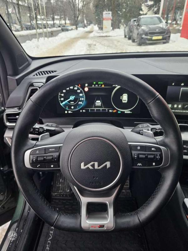 Green Kia Sportage 2022 in Klaipeda, with an engine capacity of 1.60 L and mileage of 36 thousand km for 28499 €, photo 6 on AUTOMOTO.COM.LV