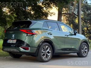 Green Kia Sportage 2022 in Riga, with an engine capacity of 1.60 L and mileage of 65 thousand km for 23500 €, photo  on AUTOMOTO.COM.LV