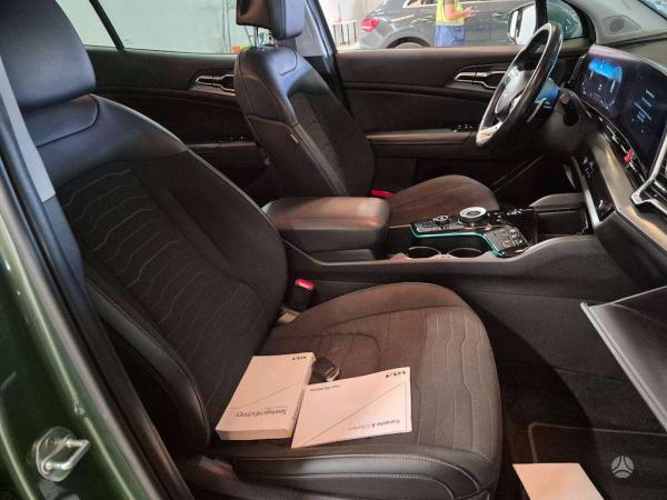 Green Kia Sportage 2022 in Vilnius, with an engine capacity of 1.60 L and mileage of 142 thousand km for 22990 €, photo 2 on AUTOMOTO.COM.LV