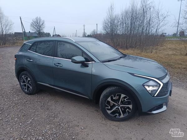 Green Kia Sportage 2023 in Siauliai, with an engine capacity of 1.60 L and mileage of 72 thousand km for 22500 €, photo 4 on AUTOMOTO.COM.LV