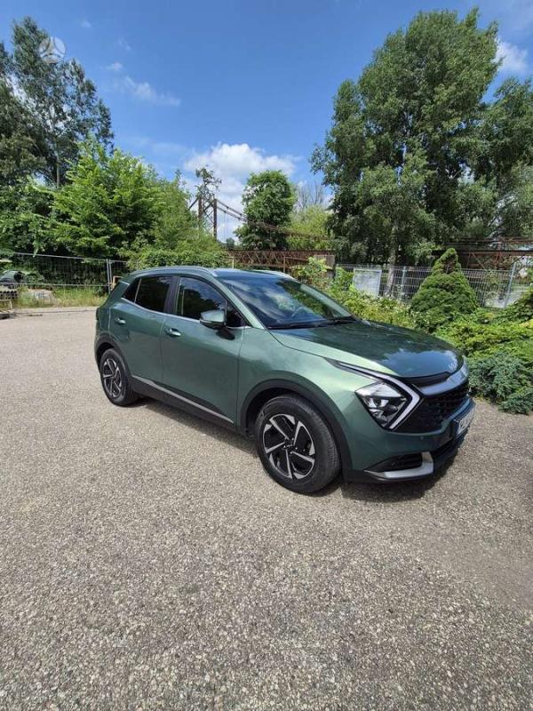 Green Kia Sportage 2023 in Vilnius, with an engine capacity of 1.60 L and mileage of 60 thousand km for 23200 €, photo 1 on AUTOMOTO.COM.LV