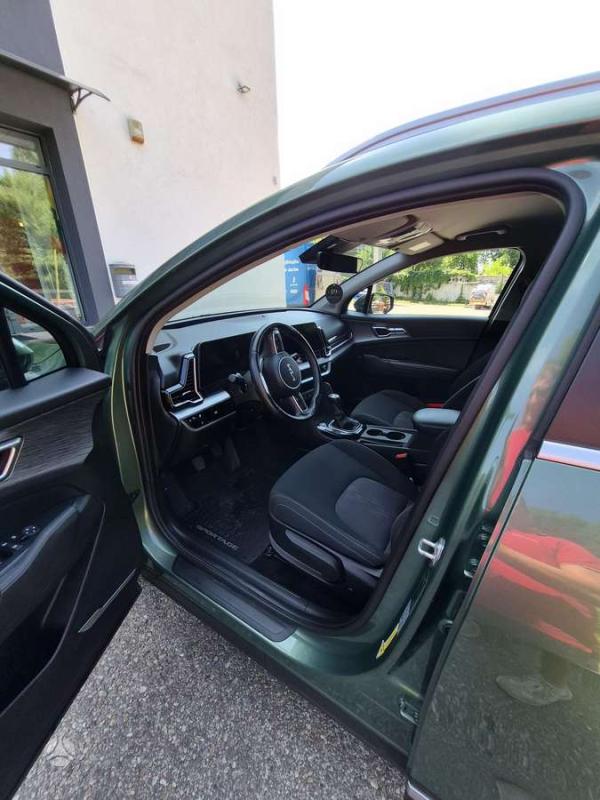 Green Kia Sportage 2023 in Vilnius, with an engine capacity of 1.60 L and mileage of 60 thousand km for 23200 €, photo 8 on AUTOMOTO.COM.LV