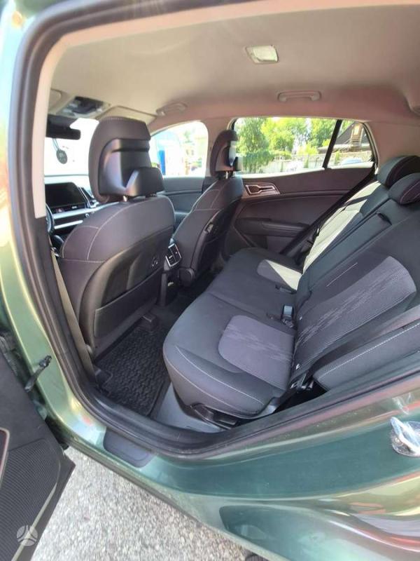 Green Kia Sportage 2023 in Vilnius, with an engine capacity of 1.60 L and mileage of 60 thousand km for 23200 €, photo 9 on AUTOMOTO.COM.LV