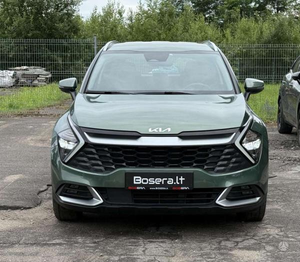 Green Kia Sportage 2023 in Vilnius, with an engine capacity of 1.60 L and mileage of 185 thousand km for 18990 €, photo 2 on AUTOMOTO.COM.LV