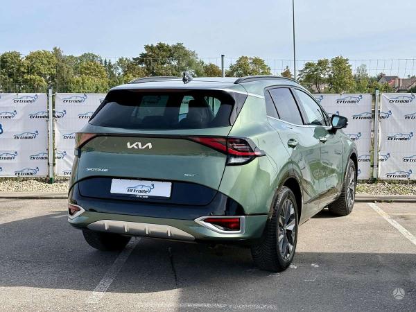 Green Kia Sportage 2023 in Vilnius, with an engine capacity of 1.60 L and mileage of 167 thousand km for 23700 €, photo 4 on AUTOMOTO.COM.LV