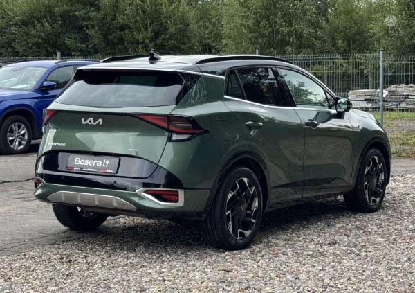 Green Kia Sportage 2024 in Vilnius, with an engine capacity of 1.60 L and mileage of 164 thousand km for 25990 €, photo 5 on AUTOMOTO.COM.LV
