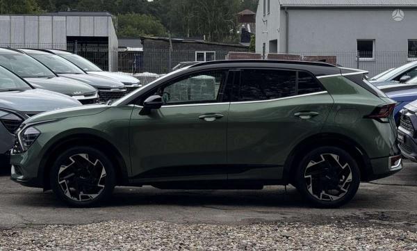 Green Kia Sportage 2024 in Vilnius, with an engine capacity of 1.60 L and mileage of 164 thousand km for 25990 €, photo 8 on AUTOMOTO.COM.LV