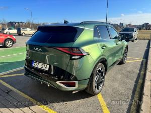 Green Kia Sportage 2022 in Tallinn, with an engine capacity of 1.60 L and mileage of 62 thousand km for 29990 €, photo 3 on AUTOMOTO.COM.LV