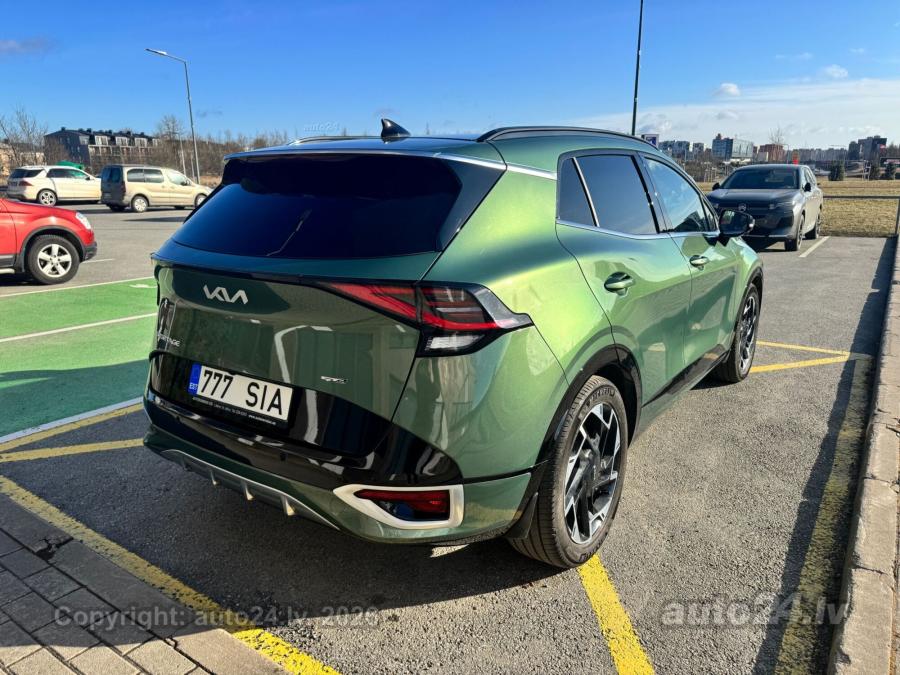 Green Kia Sportage 2022 in Tallinn, with an engine capacity of 1.60 L and mileage of 62 thousand km for 29990 €, photo 3 on AUTOMOTO.COM.LV