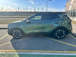 Green Kia Sportage 2022 in Tallinn, with an engine capacity of 1.60 L and mileage of 62 thousand km for 29990 €, photo 5 on AUTOMOTO.COM.LV