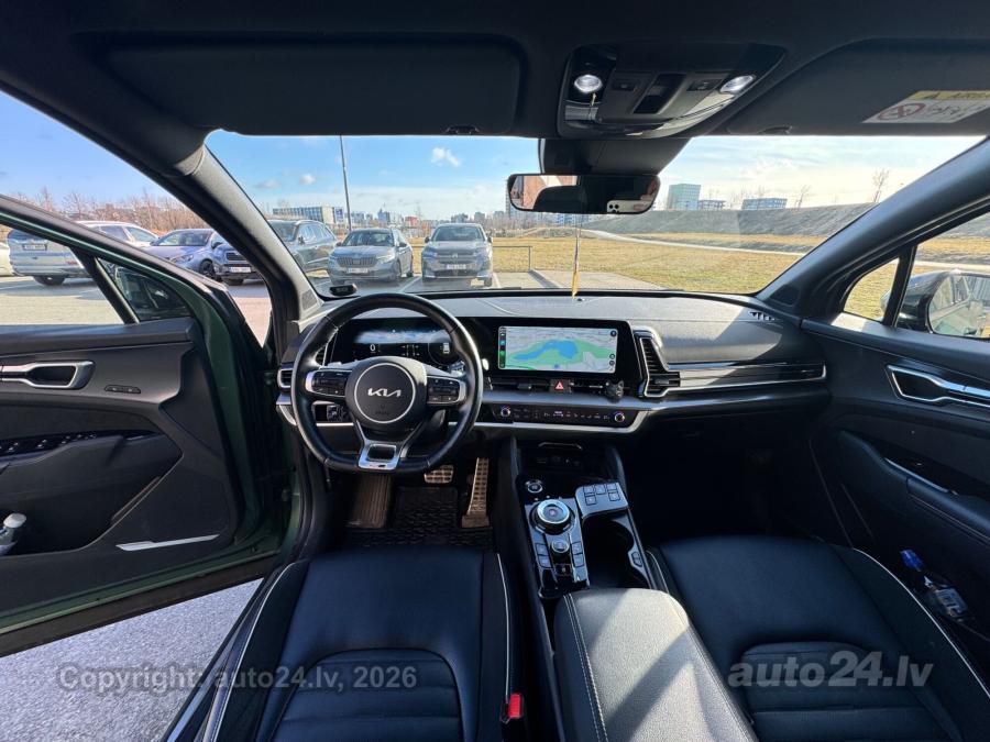 Green Kia Sportage 2022 in Tallinn, with an engine capacity of 1.60 L and mileage of 62 thousand km for 29990 €, photo 7 on AUTOMOTO.COM.LV
