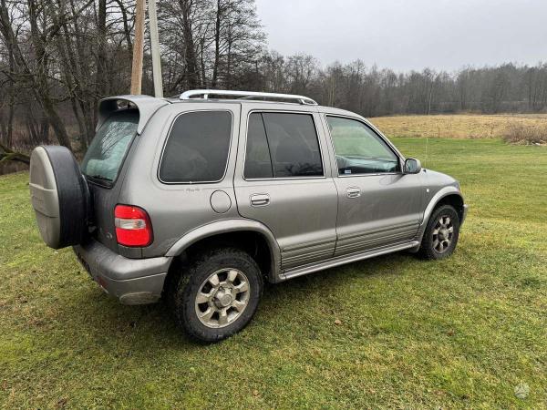 Grey Kia Sportage 2003 in Vilnius, with an engine capacity of 2.00 L and mileage of 49 thousand km for 1500 €, photo 8 on AUTOMOTO.COM.LV