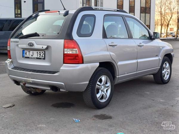 Grey Kia Sportage 2006 in Kaunas, with an engine capacity of 2.00 L and mileage of 263 thousand km for 2150 €, photo 5 on AUTOMOTO.COM.LV