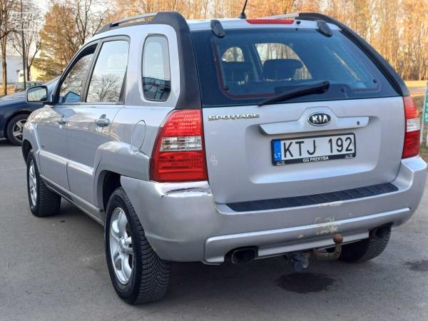 Grey Kia Sportage 2006 in Kaunas, with an engine capacity of 2.00 L and mileage of 263 thousand km for 2150 €, photo 7 on AUTOMOTO.COM.LV