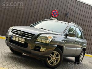 Pelēks Kia Sportage 2006 Rīga, ar dzinēja tilpumu 2.00 L un nobraukumu 103 tūkst. km par 2590 €, foto  vietnē AUTOMOTO.COM.LV