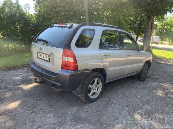 Grey Kia Sportage 2006 in Ogre, with an engine capacity of 2.00 L and mileage of 221 thousand km for 1450 €, photo 3 on AUTOMOTO.COM.LV