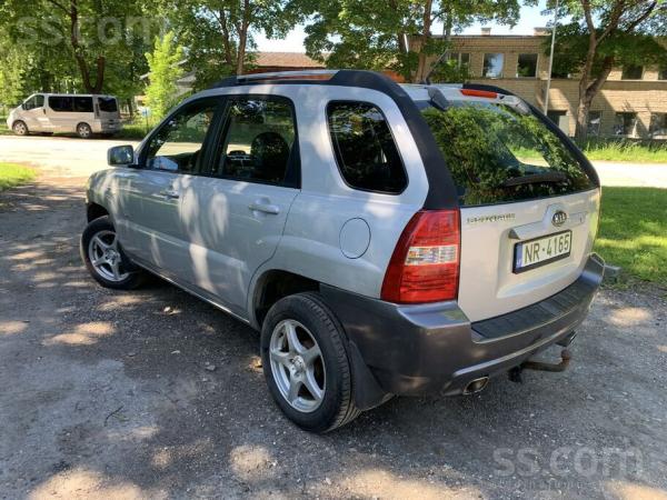 Grey Kia Sportage 2006 in Ogre, with an engine capacity of 2.00 L and mileage of 221 thousand km for 1450 €, photo 5 on AUTOMOTO.COM.LV