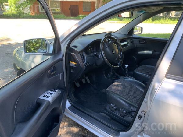 Grey Kia Sportage 2006 in Ogre, with an engine capacity of 2.00 L and mileage of 221 thousand km for 1450 €, photo 9 on AUTOMOTO.COM.LV