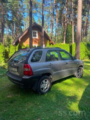 Pelēks Kia Sportage 2006 Rīga, ar dzinēja tilpumu 1.90 L un nobraukumu 167 tūkst. km par 1200 €, foto  vietnē AUTOMOTO.COM.LV