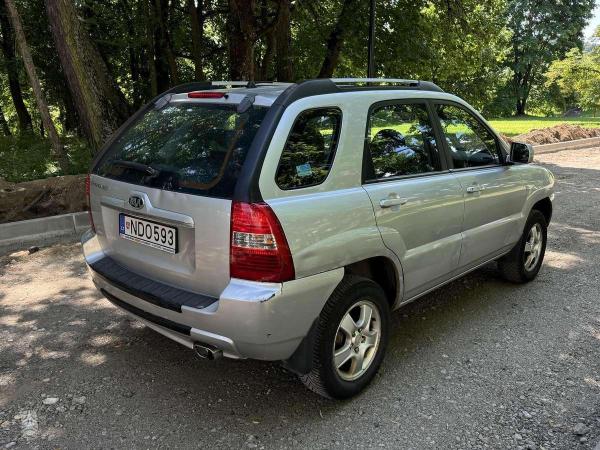 Grey Kia Sportage 2007 in Vilnius, with an engine capacity of 1.98 L and mileage of 220 thousand km for 1200 €, photo 3 on AUTOMOTO.COM.LV
