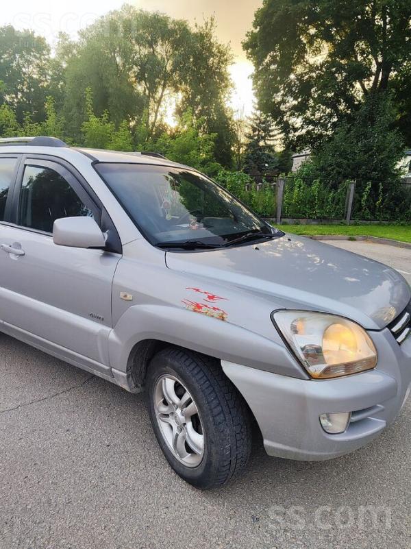Pelēks Kia Sportage 2007 Rīga, ar dzinēja tilpumu 2.00 L un nobraukumu 262 tūkst. km par 2200 €, foto 2 vietnē AUTOMOTO.COM.LV