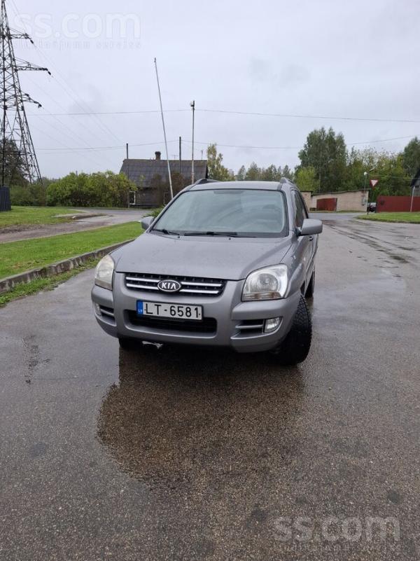 Pelēks Kia Sportage 2007 Rēzekne, ar dzinēja tilpumu 2.00 L un nobraukumu 242 tūkst. km par 2000 €, foto 1 vietnē AUTOMOTO.COM.LV