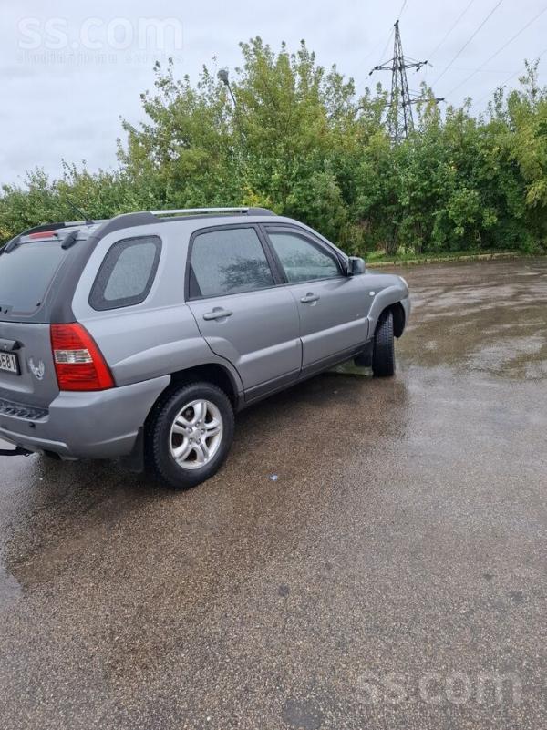 Pelēks Kia Sportage 2007 Rēzekne, ar dzinēja tilpumu 2.00 L un nobraukumu 242 tūkst. km par 2000 €, foto 5 vietnē AUTOMOTO.COM.LV