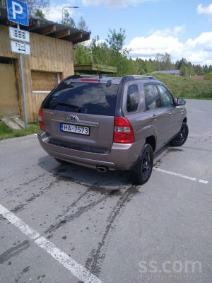 Pelēks Kia Sportage 2008 Rīga, ar dzinēja tilpumu 2.00 L un nobraukumu 254 tūkst. km par 2500 €, foto  vietnē AUTOMOTO.COM.LV