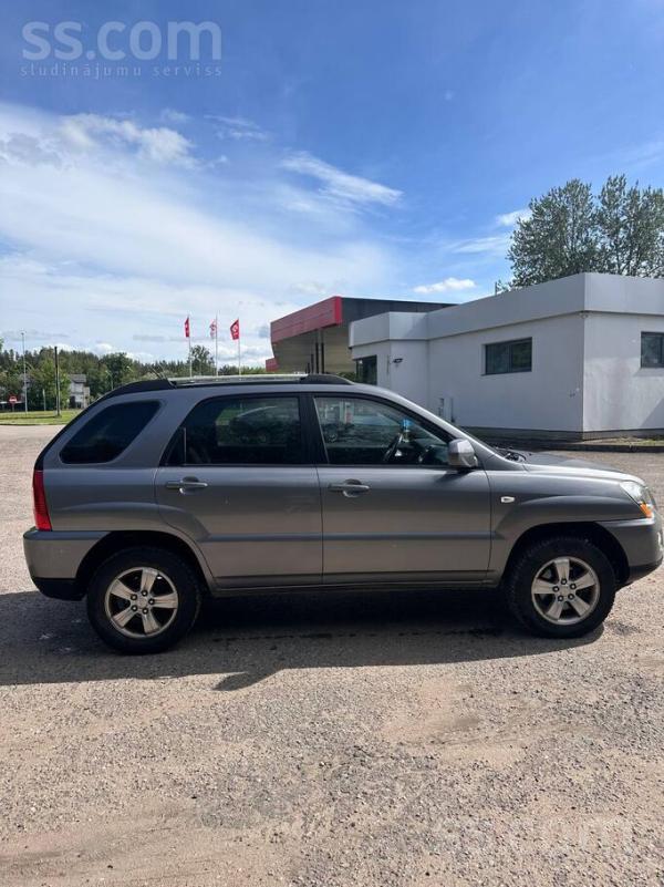 Grey Kia Sportage 2009 in Daugavpils, with an engine capacity of 2.00 L and mileage of 230 thousand km for 3500 €, photo 6 on AUTOMOTO.COM.LV