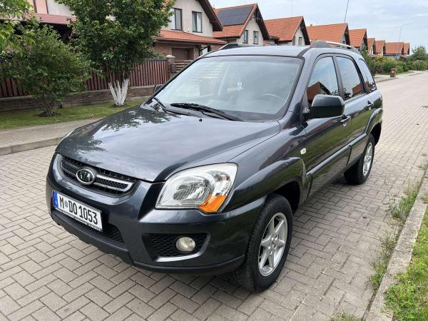 Grey Kia Sportage 2009 in Klaipeda, with an engine capacity of 1.99 L and mileage of 278 thousand km for 3450 €, photo 1 on AUTOMOTO.COM.LV