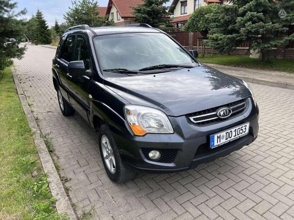 Grey Kia Sportage 2009 in Klaipeda, with an engine capacity of 1.99 L and mileage of 278 thousand km for 3450 €, photo 3 on AUTOMOTO.COM.LV
