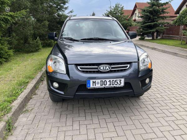 Grey Kia Sportage 2009 in Klaipeda, with an engine capacity of 1.99 L and mileage of 278 thousand km for 3450 €, photo 4 on AUTOMOTO.COM.LV