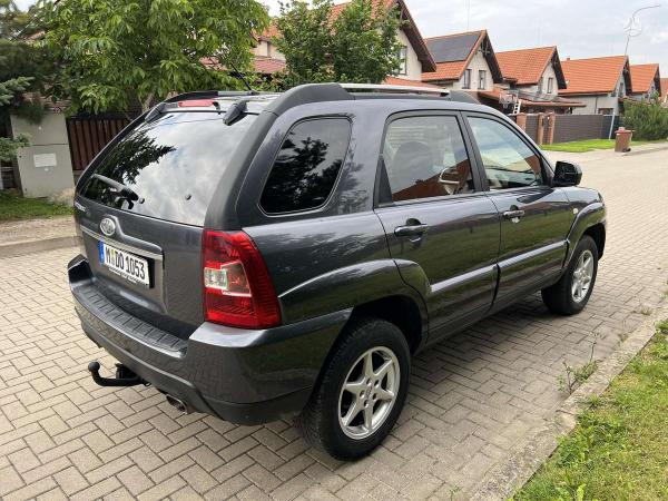 Grey Kia Sportage 2009 in Klaipeda, with an engine capacity of 1.99 L and mileage of 278 thousand km for 3450 €, photo 7 on AUTOMOTO.COM.LV