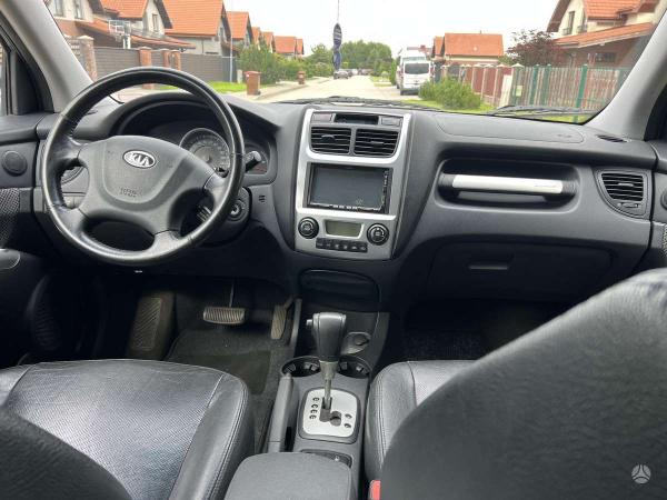 Grey Kia Sportage 2009 in Klaipeda, with an engine capacity of 1.99 L and mileage of 278 thousand km for 3450 €, photo 9 on AUTOMOTO.COM.LV