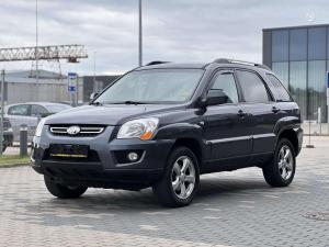 Grey Kia Sportage 2010 in Siauliai, with an engine capacity of 1.99 L and mileage of 248 thousand km for 4900 €, photo 1 on AUTOMOTO.COM.LV