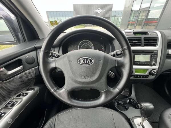 Grey Kia Sportage 2010 in Siauliai, with an engine capacity of 1.99 L and mileage of 248 thousand km for 4900 €, photo 11 on AUTOMOTO.COM.LV