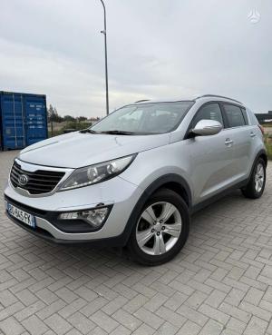 Grey Kia Sportage 2010 in Taurage, with an engine capacity of 1.70 L and mileage of 239 thousand km for 4750 €, photo 1 on AUTOMOTO.COM.LV
