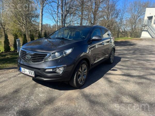 Grey Kia Sportage 2010 in Talsi, with an engine capacity of 2.00 L and mileage of 265 thousand km for 7500 €, photo 2 on AUTOMOTO.COM.LV