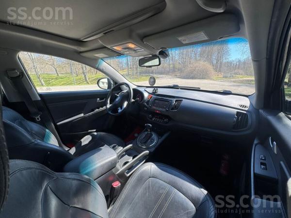 Grey Kia Sportage 2010 in Talsi, with an engine capacity of 2.00 L and mileage of 265 thousand km for 7500 €, photo 5 on AUTOMOTO.COM.LV