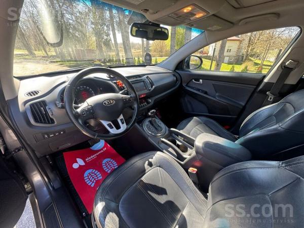 Grey Kia Sportage 2010 in Talsi, with an engine capacity of 2.00 L and mileage of 265 thousand km for 7500 €, photo 6 on AUTOMOTO.COM.LV