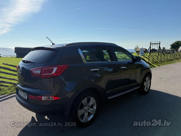 Grey Kia Sportage 2010 in Tallinn, with an engine capacity of 1.60 L and mileage of 171 thousand km for 4000 €, photo 5 on AUTOMOTO.COM.LV