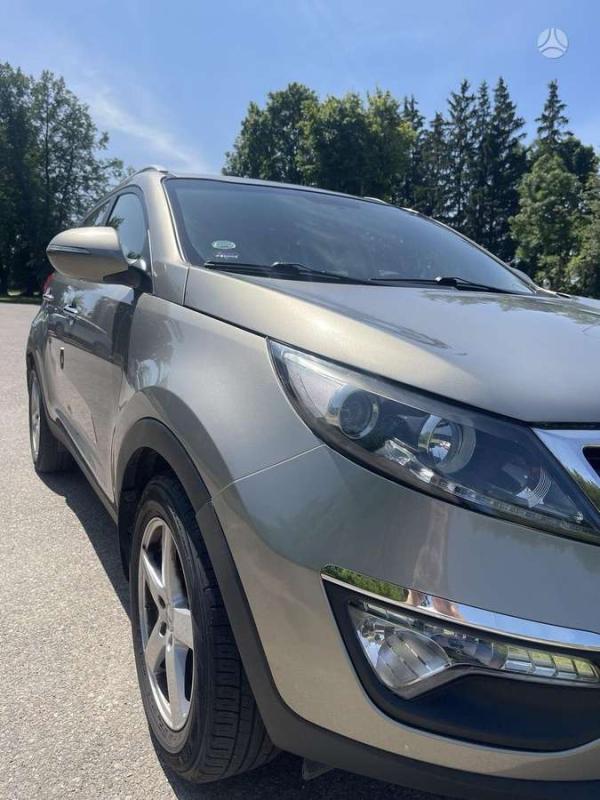 Pelēks Kia Sportage 2011 Viļņa, ar dzinēja tilpumu 1.59 L un nobraukumu 168 tūkst. km par 5800 €, foto 3 vietnē AUTOMOTO.COM.LV